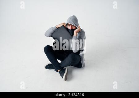 male thief hooded head hacking technology security Lifestyle Stock Photo - Alamy