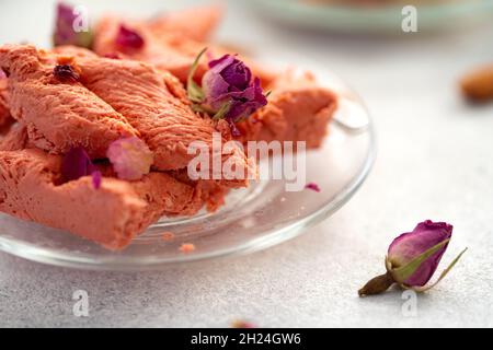 Close up of colorful Turkish halva sweets on gray surface Stock Photo ...