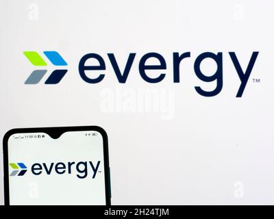 In this photo illustration an Evergy logo of an US electric services ...