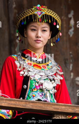 An Attractive Young Chinese Woman Poses For A Photo On The Avenue Of ...