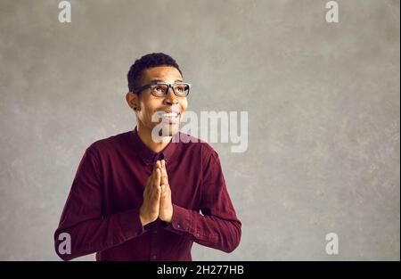 Faithful African man praying looking to sky with HOPE and FAITH Stock ...