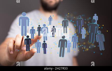 Person presenting 3D render of unity group and teamwork icons Stock ...