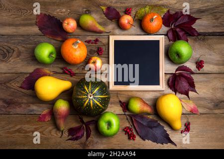 Some mock-up pumpkins on wooden table. Moody Style. Halloween concept ...