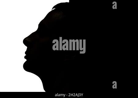 Silhouette close up portrait of a man at sunset Stock Photo - Alamy