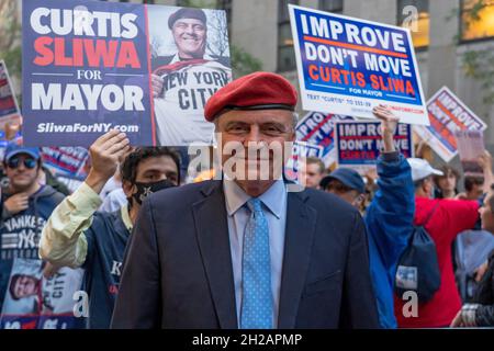 Mayoral candidate Curtis Sliwa arrives to vote with his wife Nancy ...