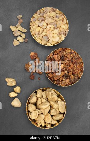Gold frankincense and myrrh in bowls. Symbolic gifts in the Christian ...