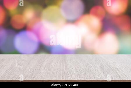 Tabletop made of wood with the blurred background of leaf bokeh, used ...