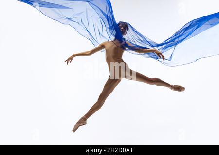 Portrait of young adorable Japanese ballerina dancing with transparent ...
