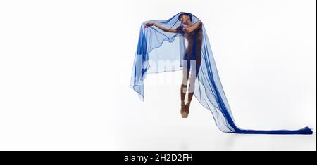 Portrait of young adorable Japanese ballerina dancing with transparent ...