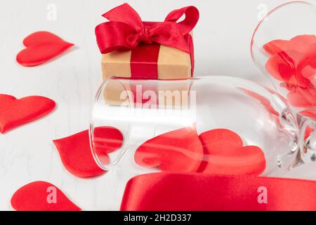 glasses with scattered hearts valentine's day Stock Photo - Alamy