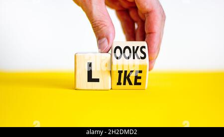 Looks like symbol. Concept words Looks like on wooden cubes ...