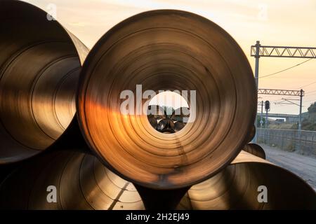 hollow large iron sewer pipes Stock Photo - Alamy