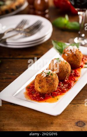 Arancini. Italian Rice Balls with Mozzarella and Sun-dried tomatoes ...