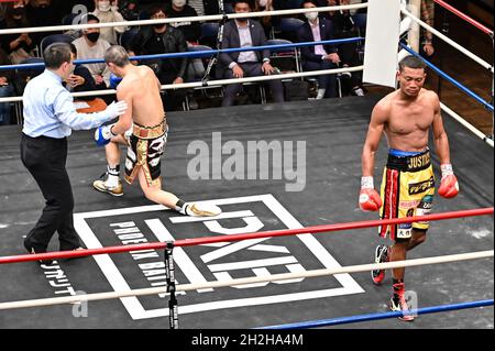 Andy Hiraoka (red gloves) and Jin Sasaki (blue gloves) compete during the vacant WBO Asia ...