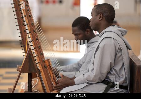 SENEGAL, Benedictine monastery Keur Moussa, monks work in workshop to ...