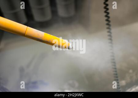 Powder coating gun tip Stock Photo - Alamy