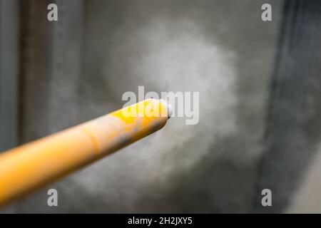 Powder coating gun tip Stock Photo - Alamy