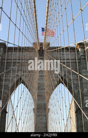 American Flag Atop the Brooklyn Bridge, New York City Stock Photo - Alamy