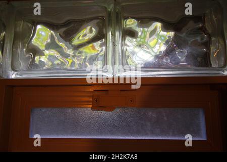 Glass block window with air vent in a basement Stock Photo - Alamy