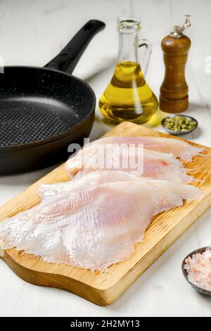Closeup view of raw fresh stingray wings ready for frying Stock Photo ...