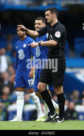 referee Andrew Madley points to the penalty spot during the Premier ...