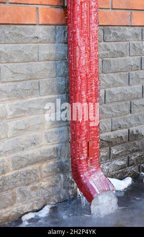 Frozen Rain Water Draining Gutter Downpipe Stock Photo - Alamy