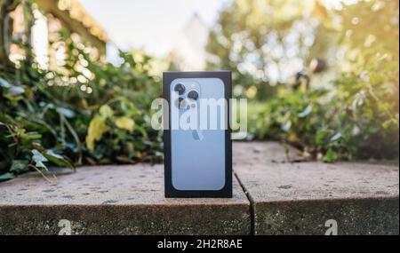 Cardboard box of new Apple Computers iphone 13 Pro smartphone hero ...