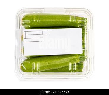 Packaged and labeled fresh zucchini on isolated white background Stock ...