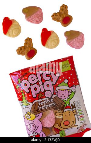 Bag of M&S Percy Pig Festive Helpers sweets made with real fruit juice isolated on white ...