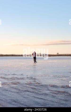 Long Distance Nordic Tour Ice Skating in Sweden Stock Photo - Alamy