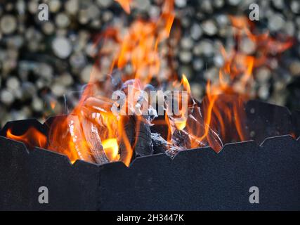 Bright fire flame outdoors over the brazier Stock Photo - Alamy