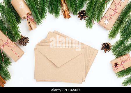 Mail envelope made of craft paper with a white sheet for text on a ...