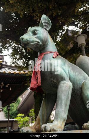 Statue of Kitsune (fox) part of Japanese folklore, in front of Saidaiji ...