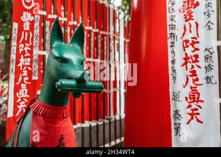 Statue of Kitsune (fox) part of Japanese folklore, in front of Saidaiji ...