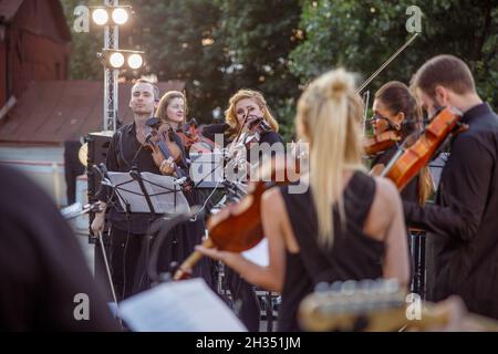 Musical ensemble having concert rehearsal on the street Stock Photo - Alamy