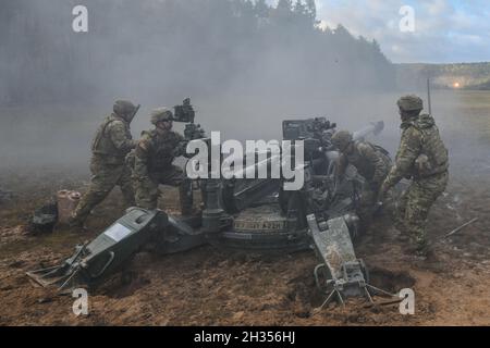 Soldiers of the Field Artillery Squadron, 2nd Cavalry Regiment, fire ...