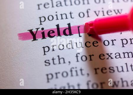 Fake Dictionary word, Dictionary definition of yield Stock Photo - Alamy