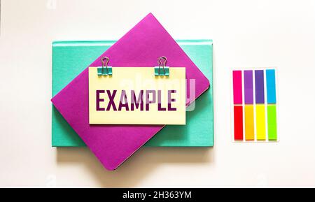 Example symbol. The concept word Example on wooden cubes. Beautiful ...