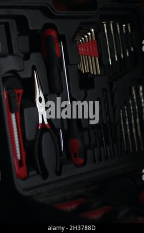 Screwdriver set in red box isolate white background Stock Photo - Alamy