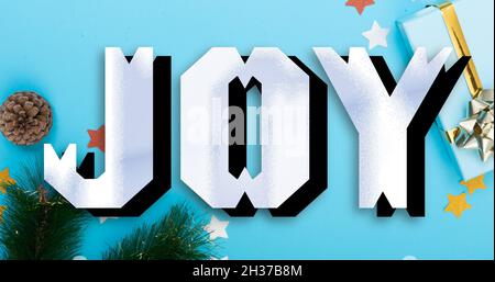 Composition of joy text over christmas presents and decorations on pink ...