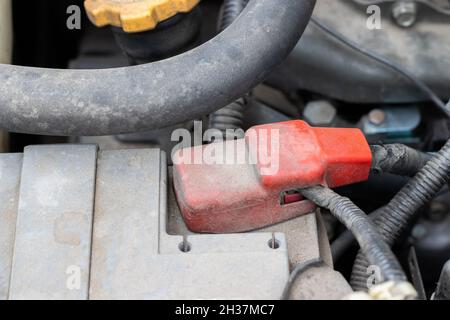 Closeup detail of a Flat-four (boxer) car engine under the open hood ...