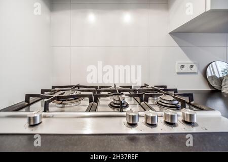 Beautiful and elegant gas stove in the kitchen Stock Photo - Alamy