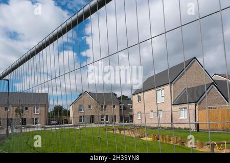 Fenced off play and grass relaxing area at Keepers Green, the new ...