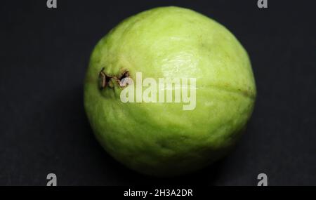 Green Guava (or) koyaka fruit is on a white background Stock Photo - Alamy