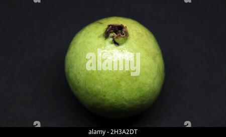 Green Guava (or) koyaka fruit is on a white background Stock Photo - Alamy