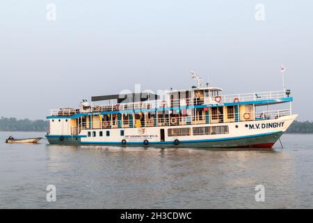 SUNDARBANS, BANGLADESH - NOVEMBER 15, 2016: Tourists cross a narrow ...