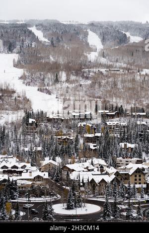 Vail Colorado town in winter time with Christmas lights and flags on ...