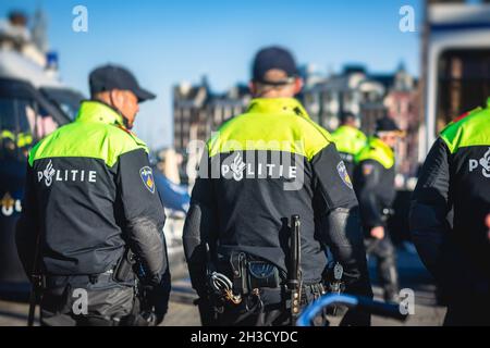 Dutch police squad formation and horseback riding mounted police back ...