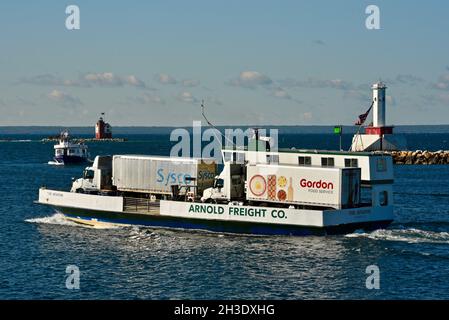 A Sysco Semi Truck delivering food that's stopped at a stop sign with ...