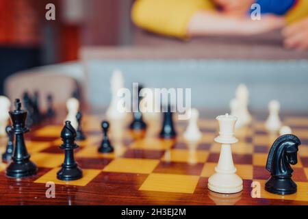 colorful chess figureson a blurred background Stock Photo - Alamy